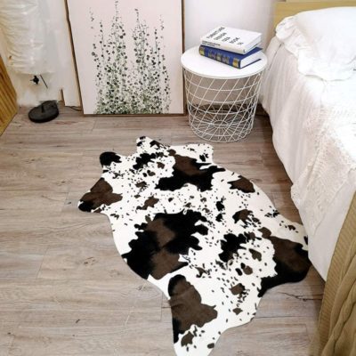12 Cowhide Rug Ideas - Real, Tricolor, and Fake Cowhides [PHOTOS]